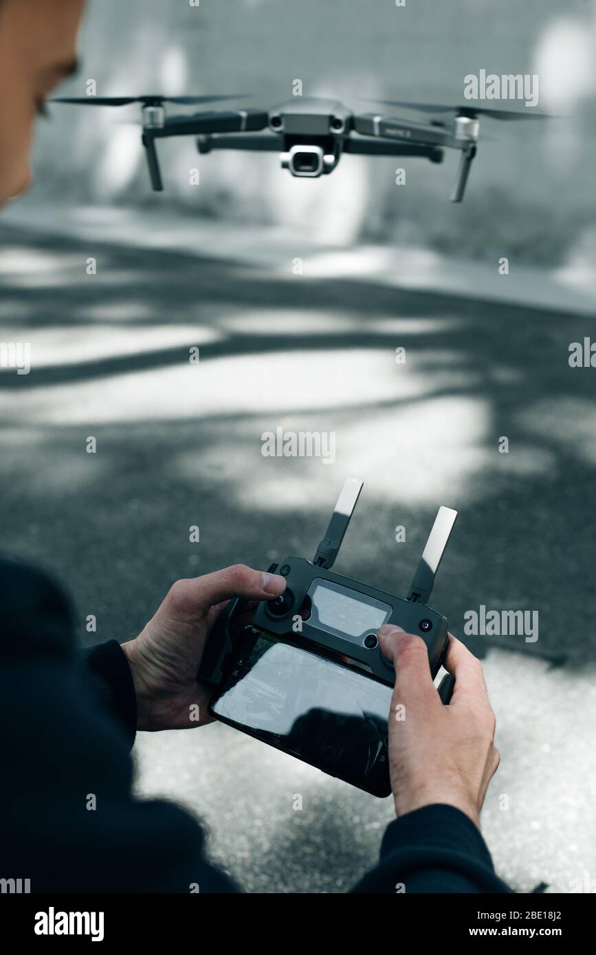 Drone remote control. Remote control in hand man. Man holds remote ...