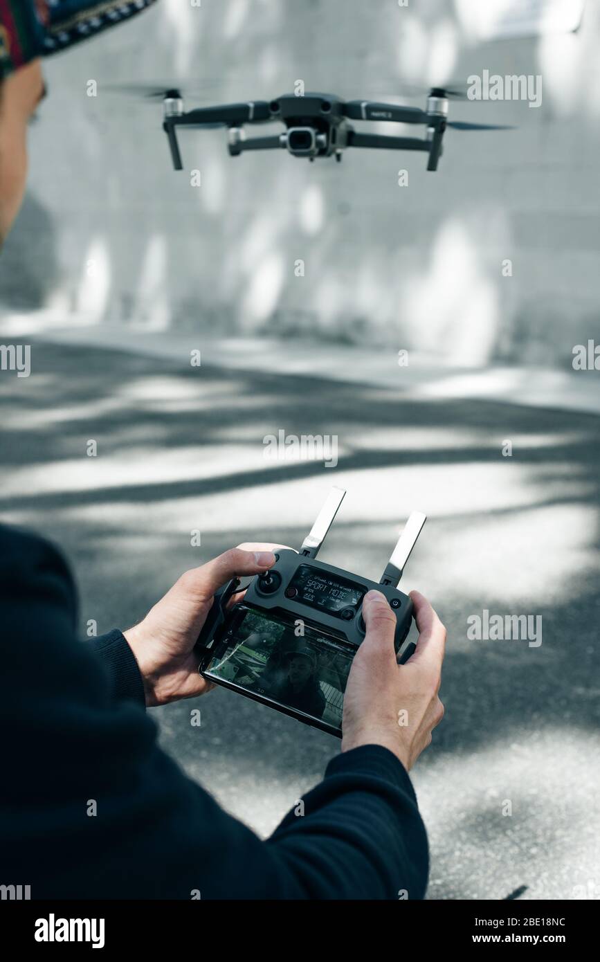 Drone remote control. Remote control in hand man. Man holds remote ...