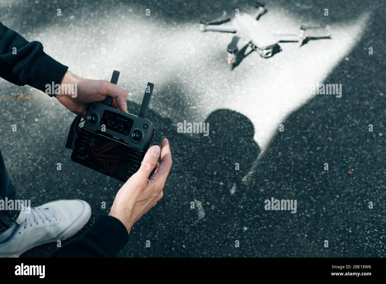 Drone remote control. Remote control in hand man. Man holds remote ...