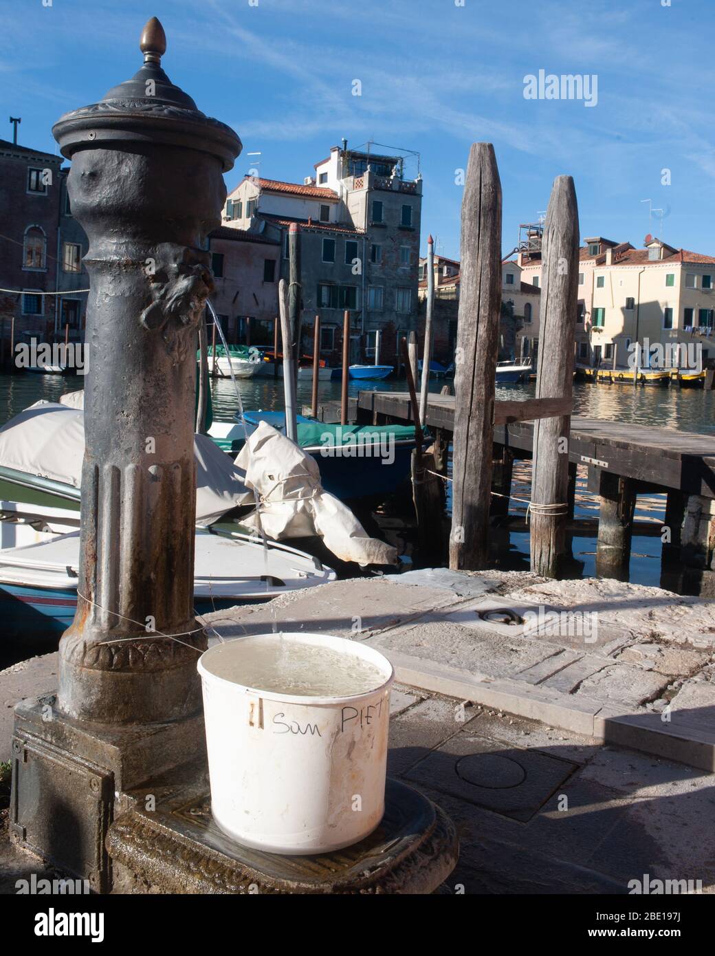 Medieval water standpipe in Venice Stock Photo - Alamy
