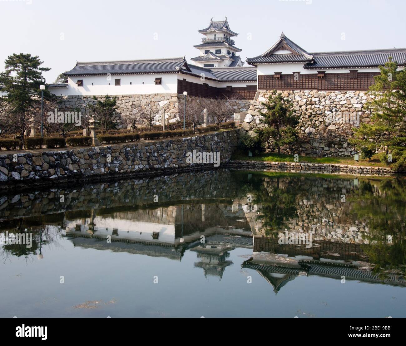Traditional Japanese castle reflected in water in Imabari, Ehime ...