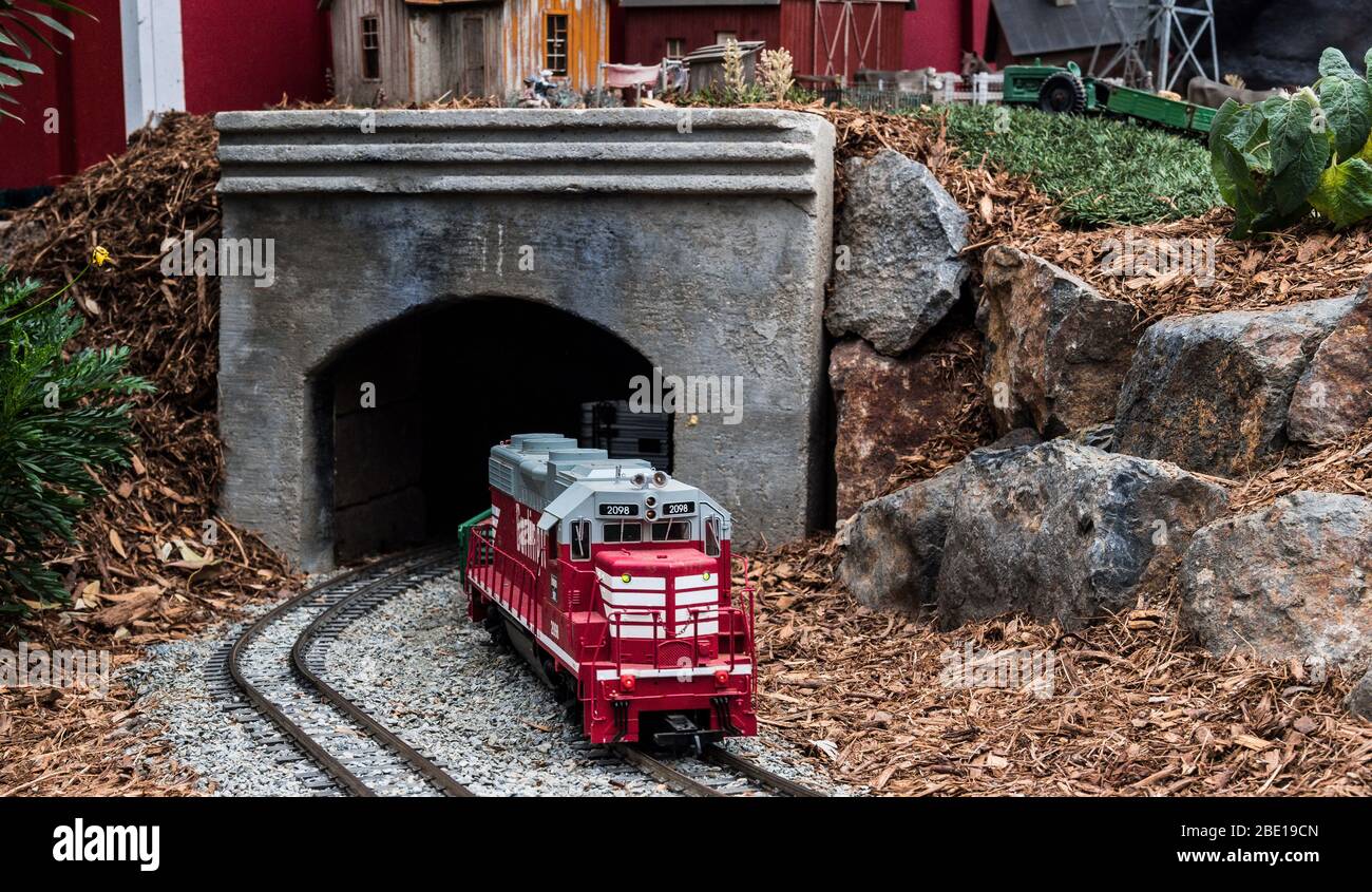 model railroad train track, tunnel, and train Stock Photo - Alamy
