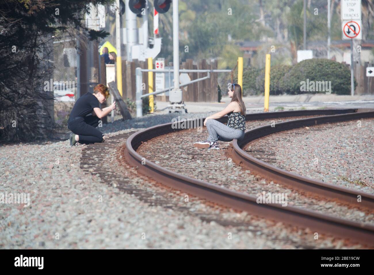 people on railroad tracks Stock Photo - Alamy