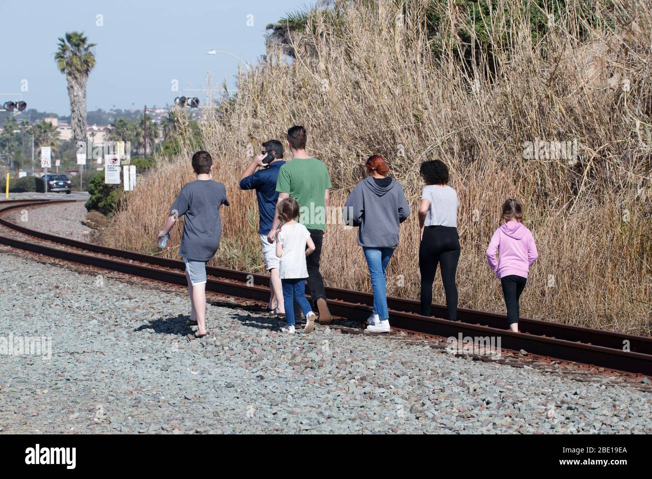 people on railroad tracks Stock Photo - Alamy