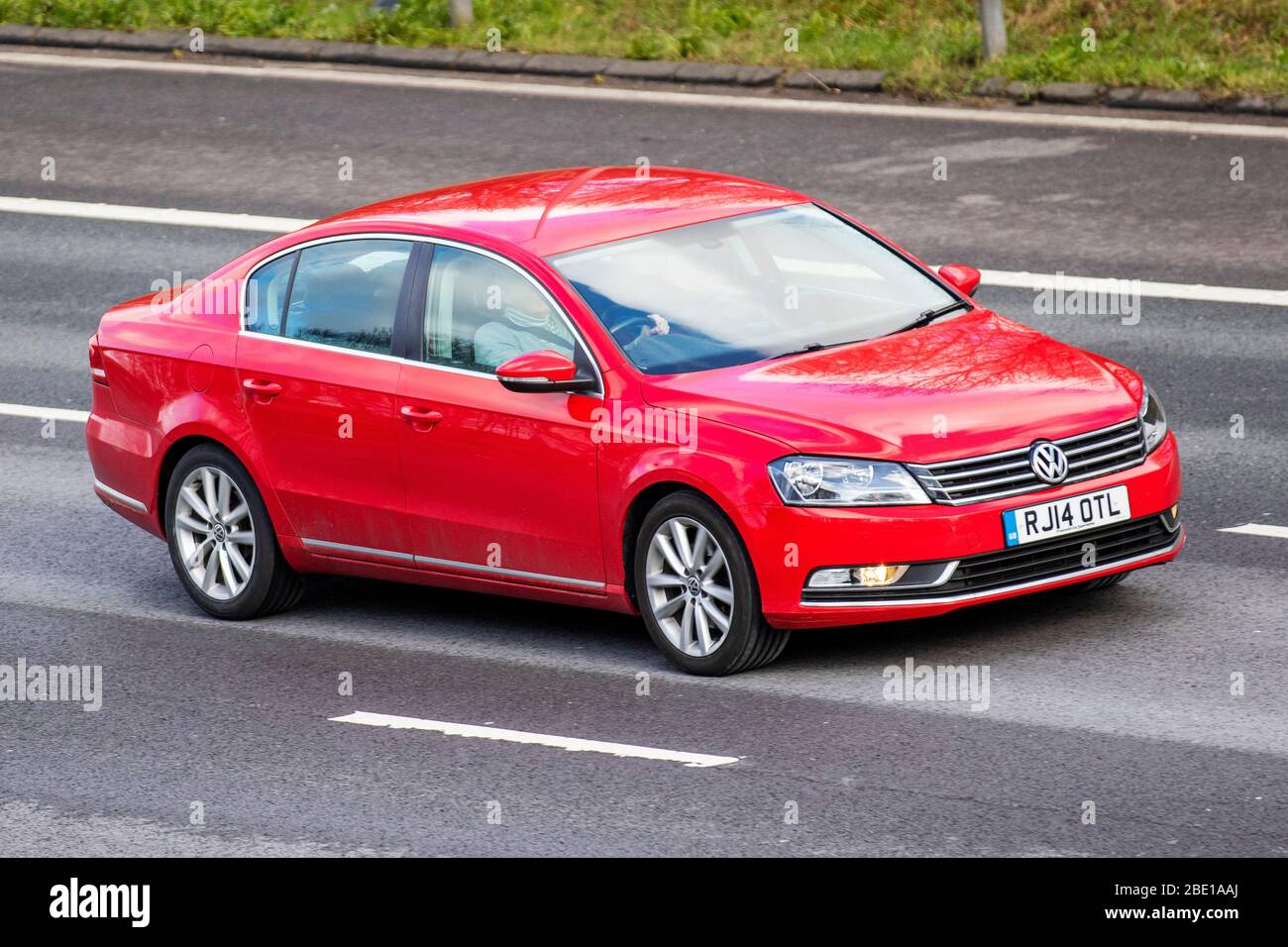 2014 red VW Volkswagen Passat Executive TDI BMT; Vehicular traffic ...
