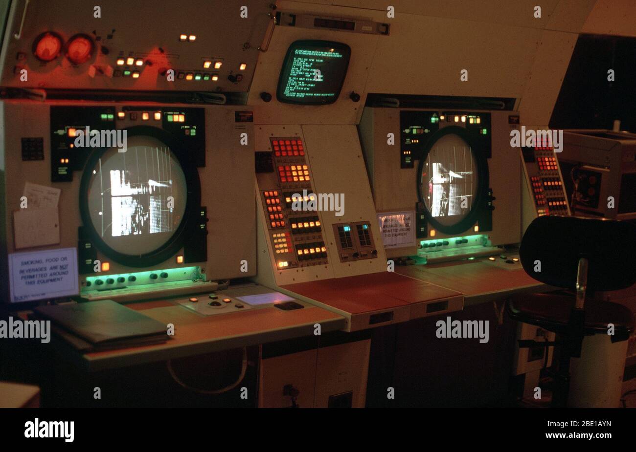 A close-up view of two AN/APN-22 precision approach radar screens in ...