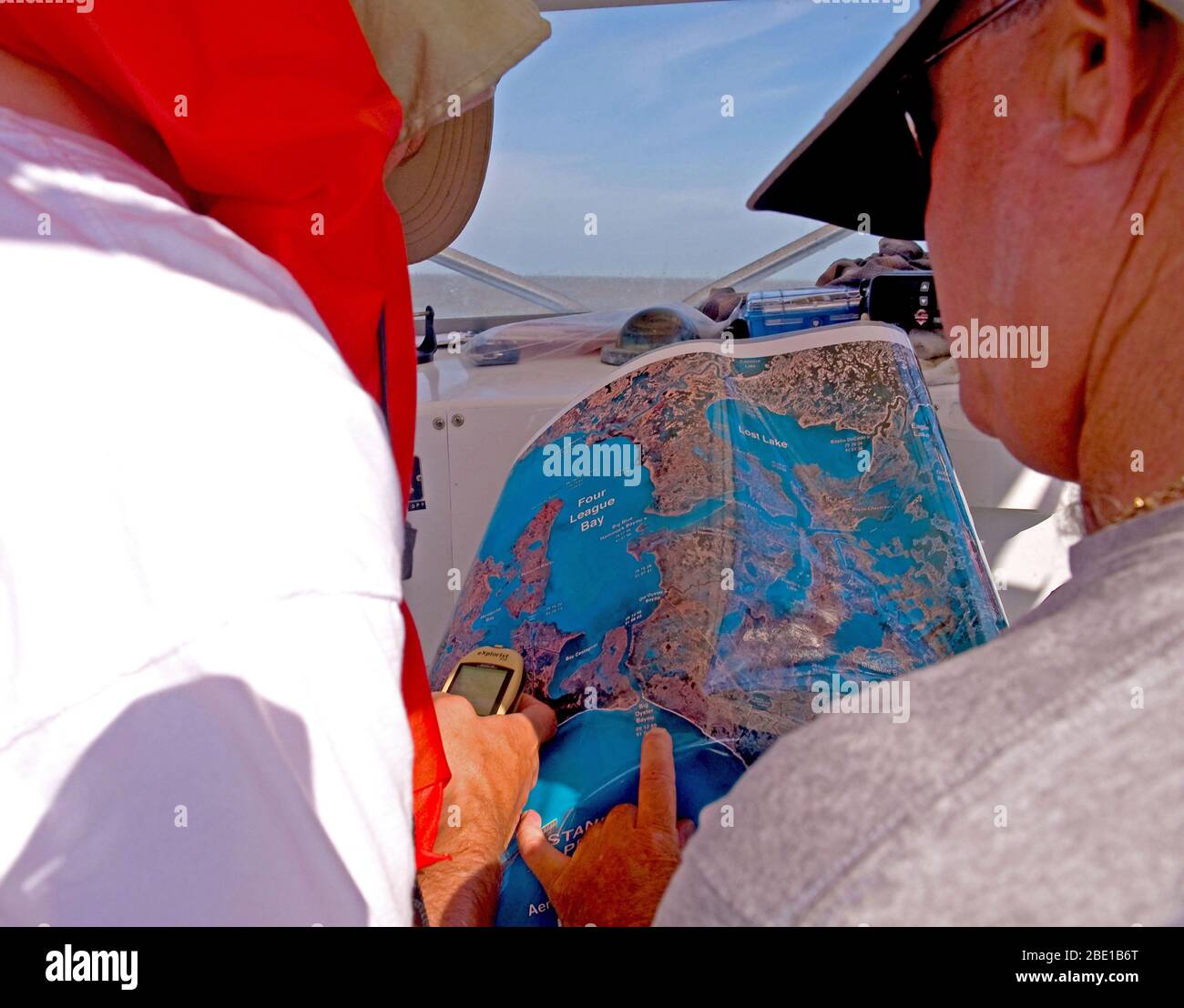 EPA workers checking maps during the BP Oil Spill clean up in 2010 ...