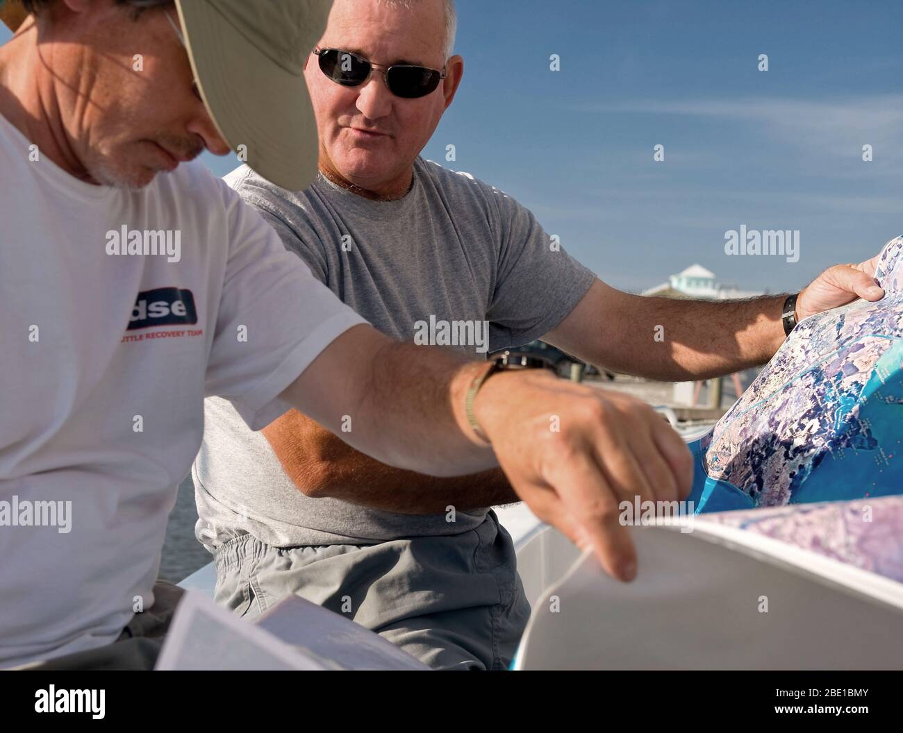 EPA workers checking maps during the BP Oil Spill clean up in 2010 ...