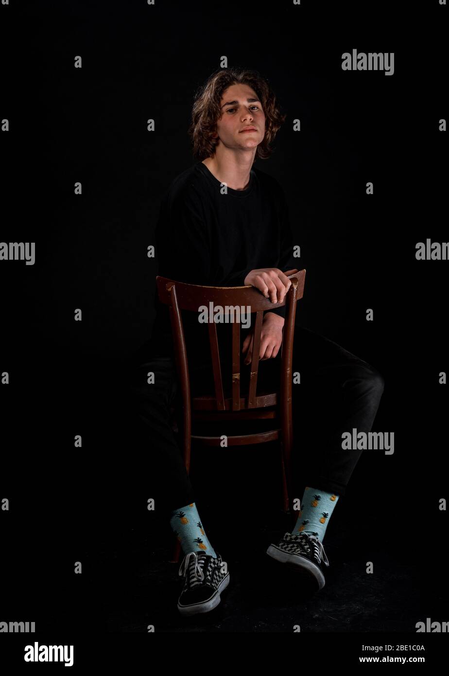 Studio body shot of a fashion male model wearing stylish clothes ...