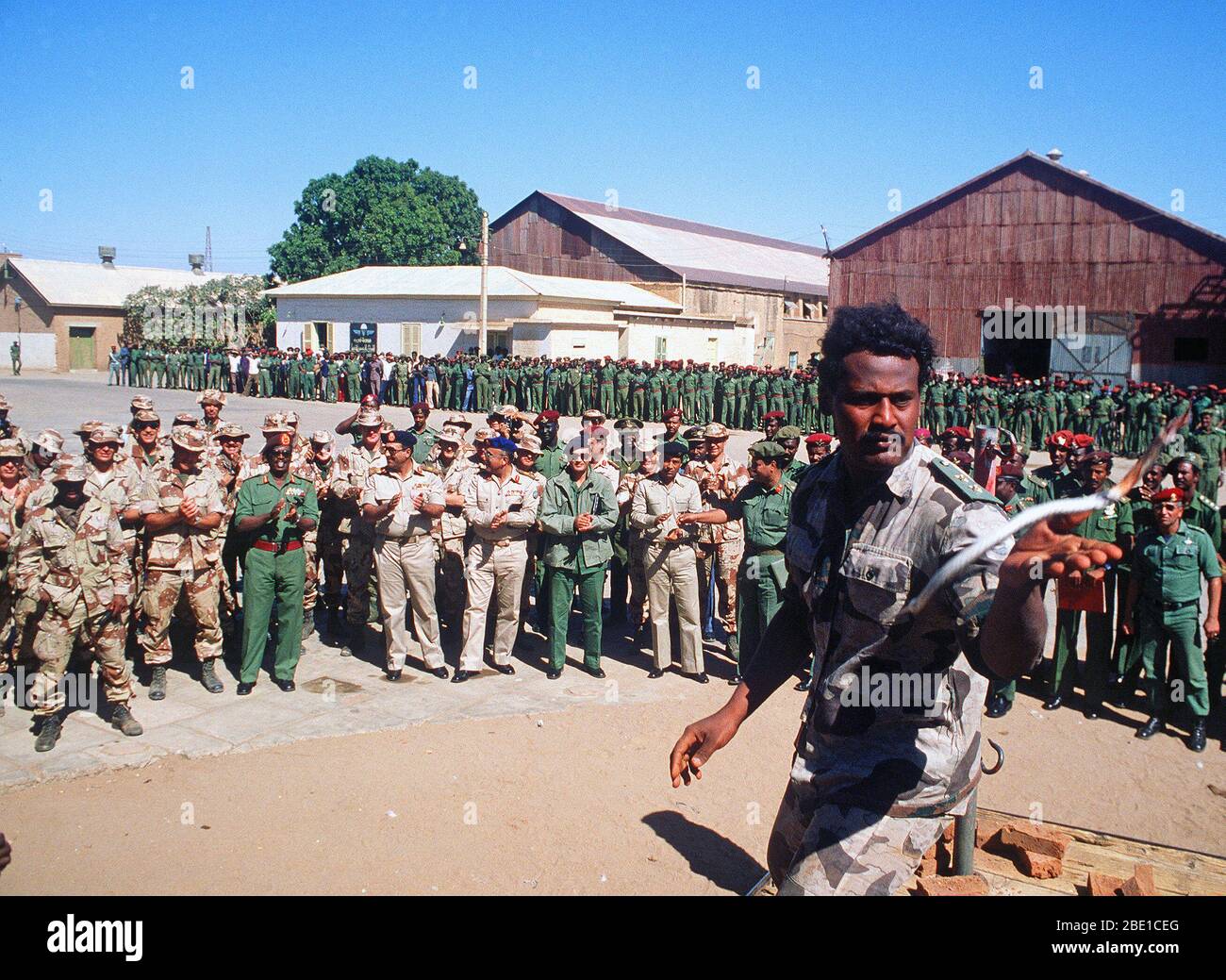 A Sudanese soldier demonstrates the military physical fitness program ...