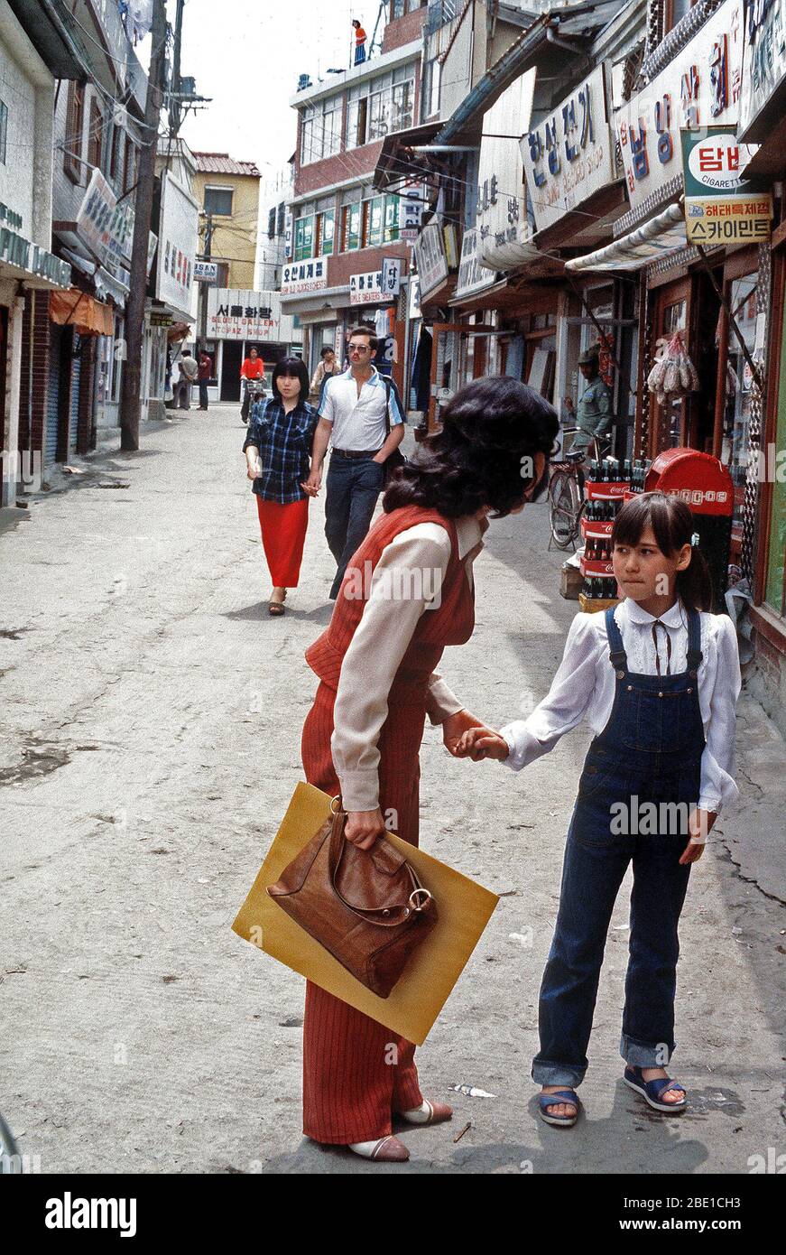 Ms. Tae Sun Pak (left), a social worker employed by the Osan Air Base ...