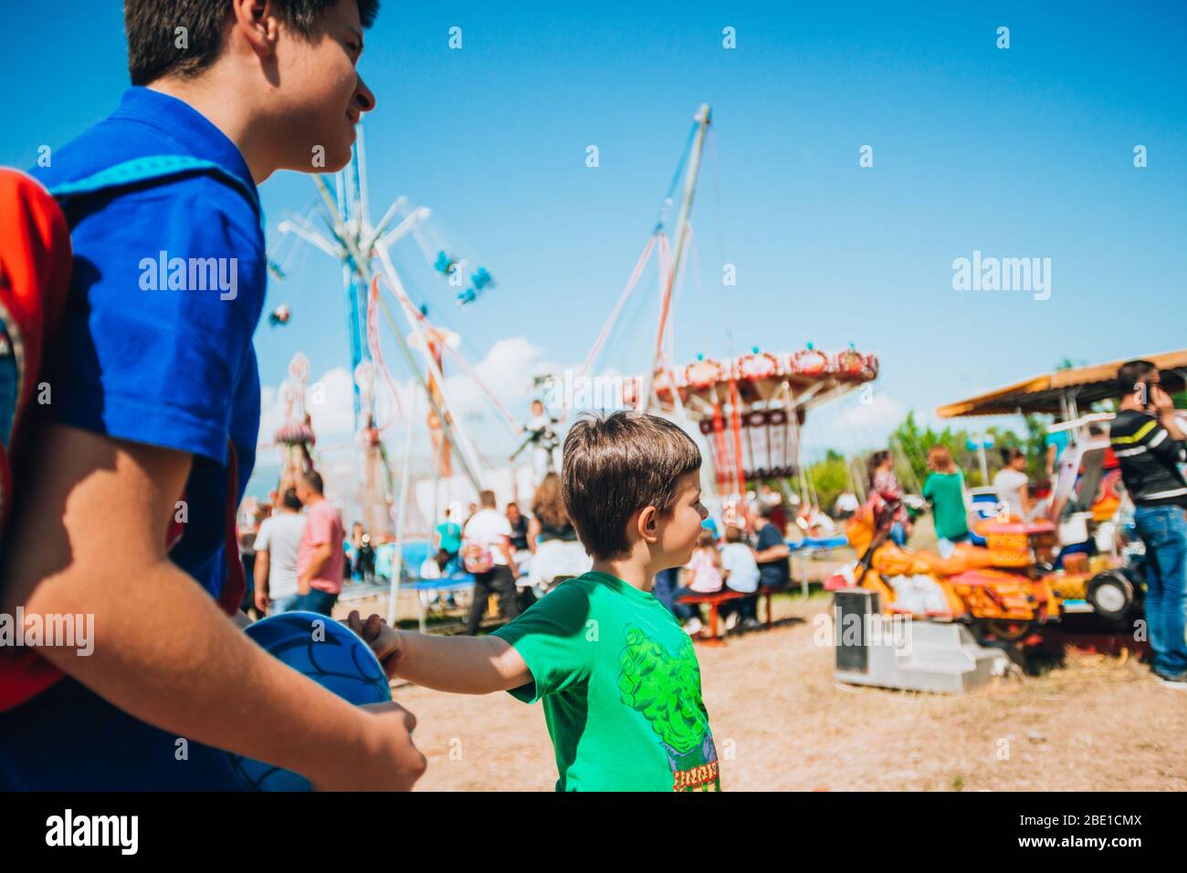 Happy kids having fun on playground in kindergarten Stock Photo - Alamy
