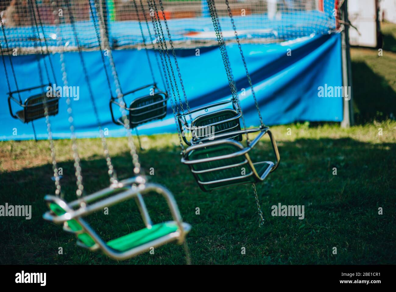 Colorful rotating chair swing ride at the local amusement park Stock ...