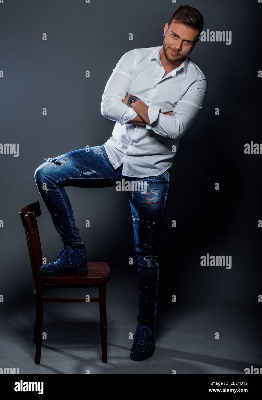 Studio body shot of a fashion male model wearing stylish clothes Stock ...