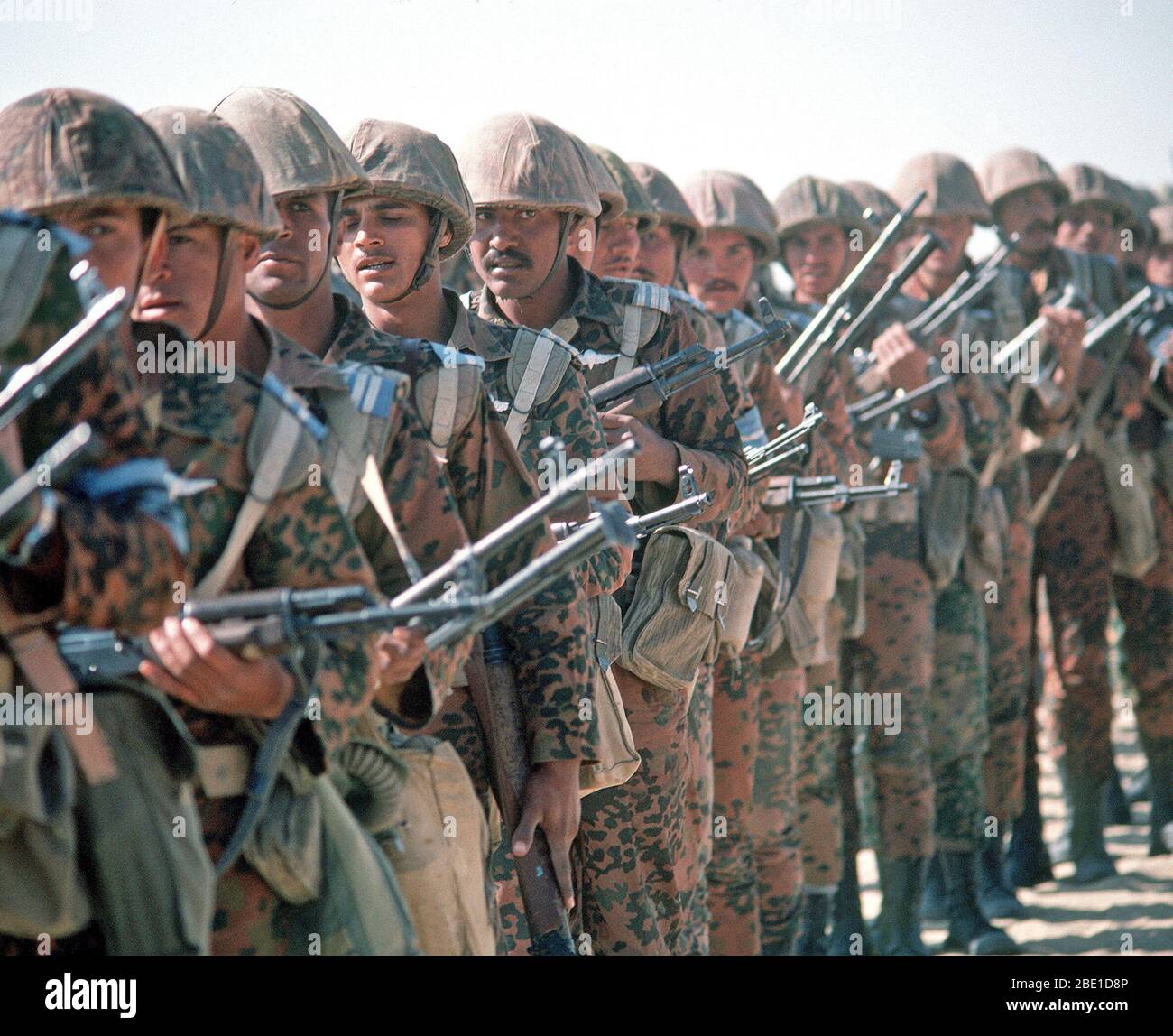 Egyptian soldiers line up in a column to await further orders during ...