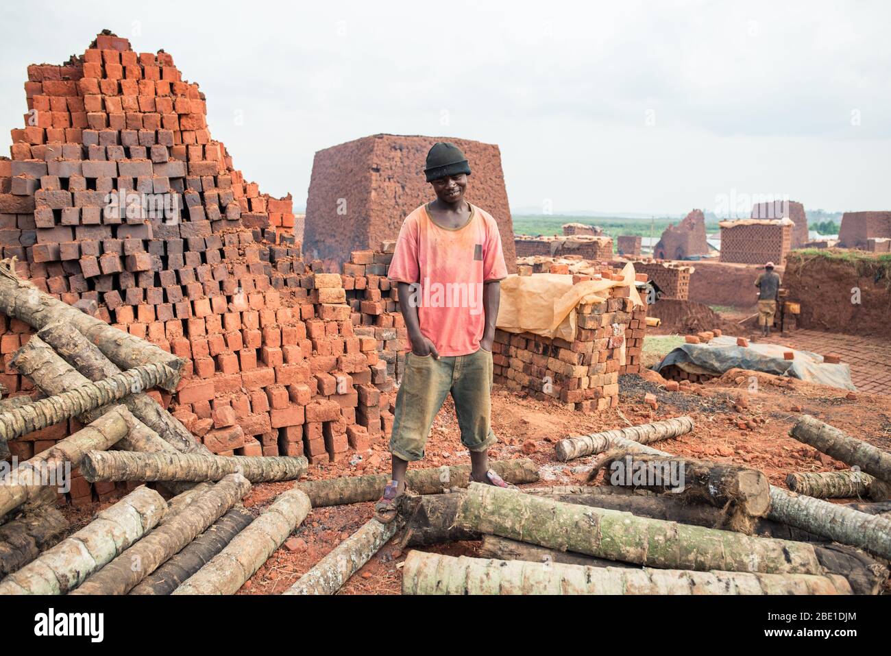 Kampala / Uganda - September 20, 2016: Black men working in mud brick ...