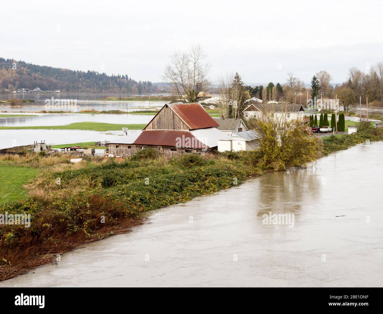 Snoqualmie river floods near the city of Duvall, farmlands and roads ...