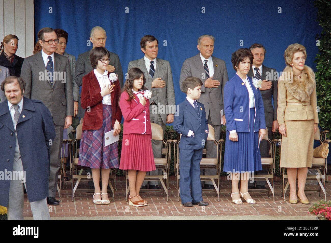 Guests attending a Medal of Honor award ceremony at the Pentagon stand ...