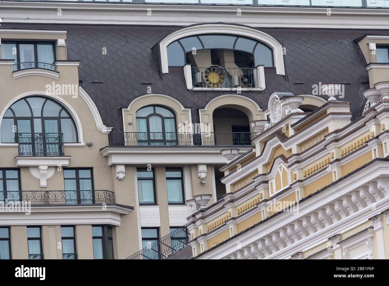Facade and roof of a beautiful building in classic style. Architecture ...