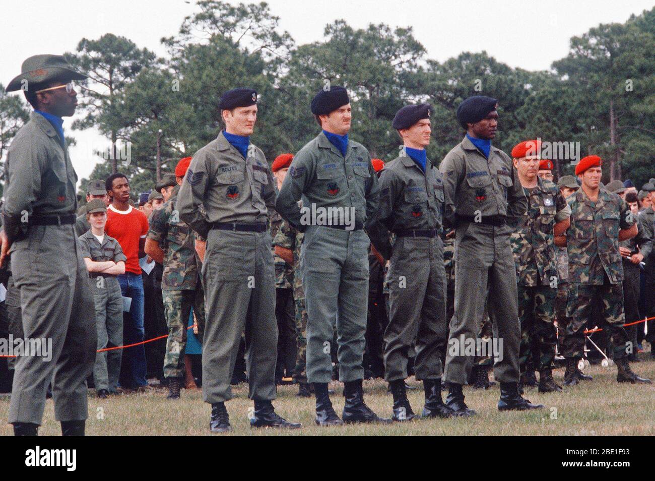 Members of the security police stand at parade rest during the 1st ...