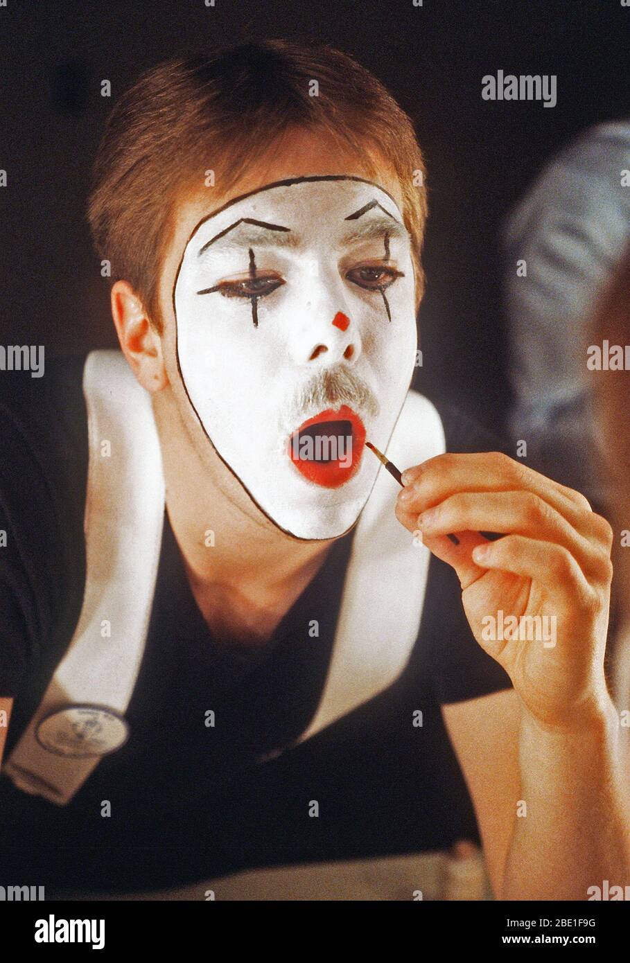 An Airman from Lackland Air Force Base, Texas, applies make-up prior to ...