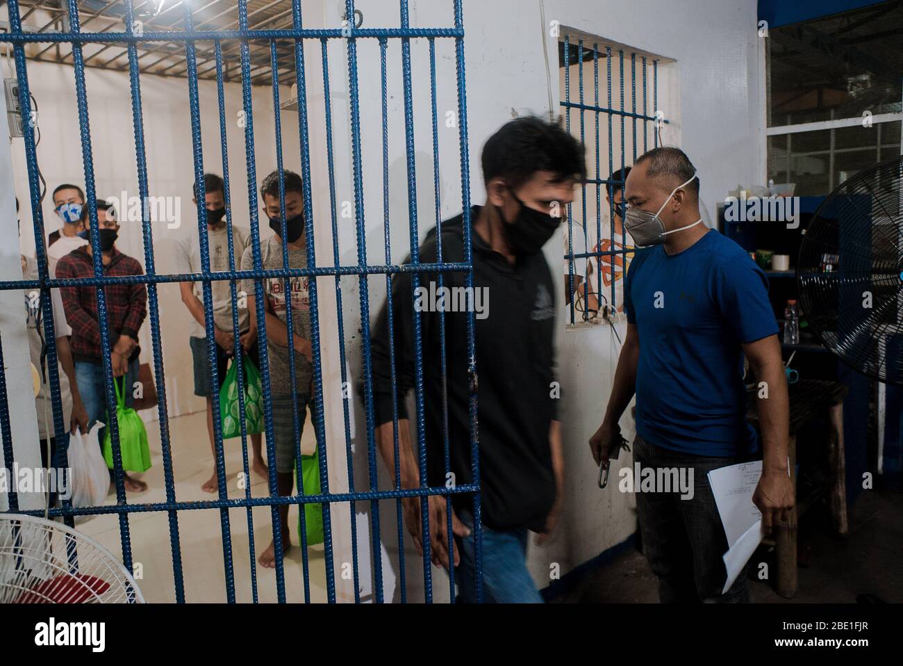 April 6, 2020 - Manila, Philippines: A detainee exits his cell, which ...