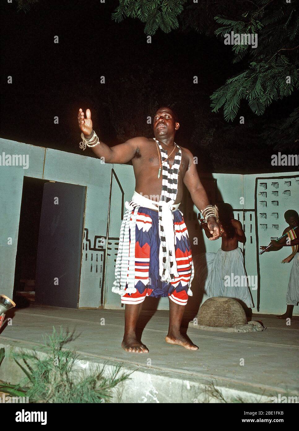 1981 - A member of a national dance troupe entertains U.S. sailors from ...
