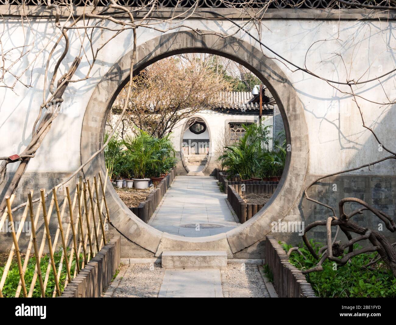 Round gate in classical Chinese garden in Prince Gong Palace, Beijing ...