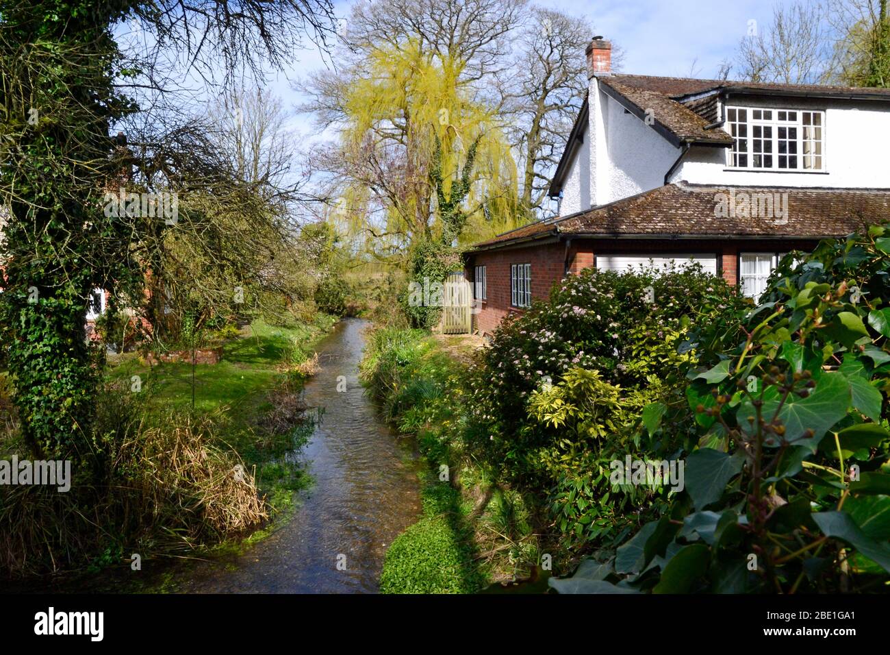 Stream running past a house in Horsenden, a hamlet in Buckinghamshire ...