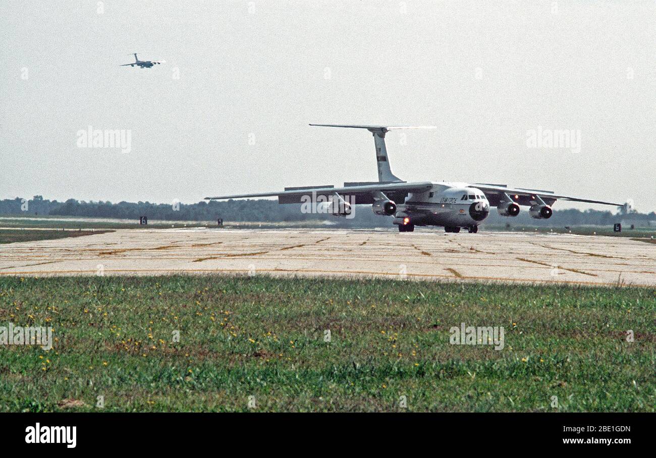 1980 - Front view of a C-141 Starlifter aircraft taxiing and another ...