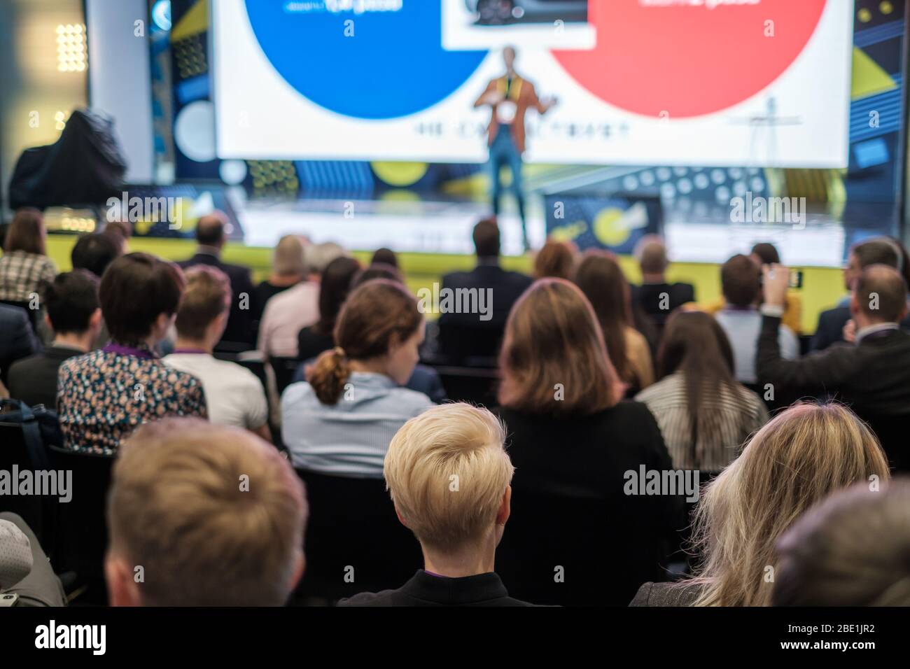 Audience listens lecturer at workshop Stock Photo - Alamy