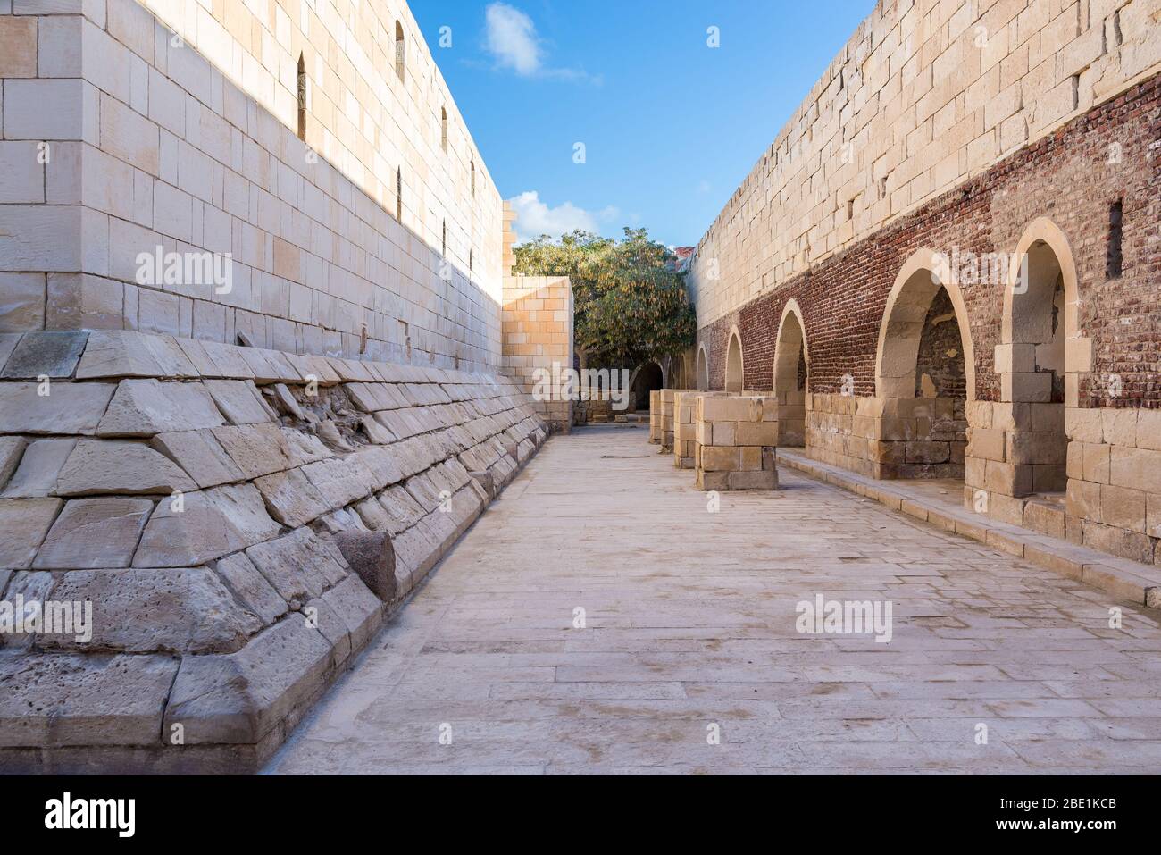 Exterior of ancient passage with shabby red bricks passage and ...