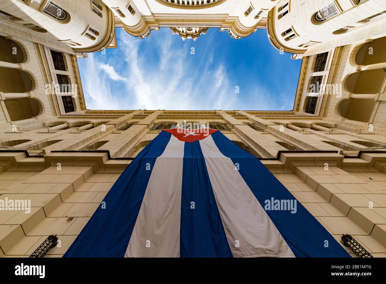 atrium with big flag of cuba in historic town of havana, cuba Stock ...