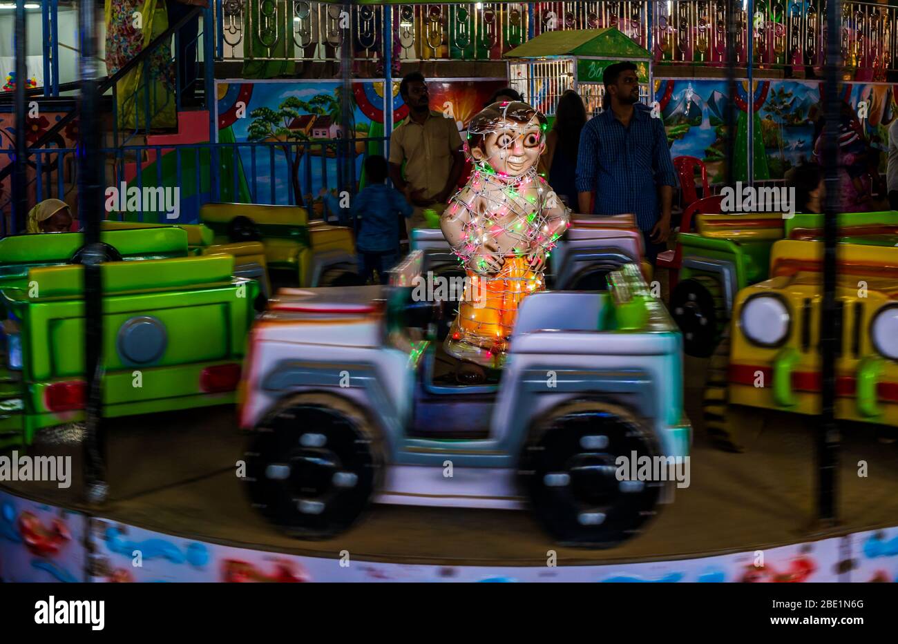 Mumbai, India - December 01, 2019: Indian kids enjoying carousel ride ...