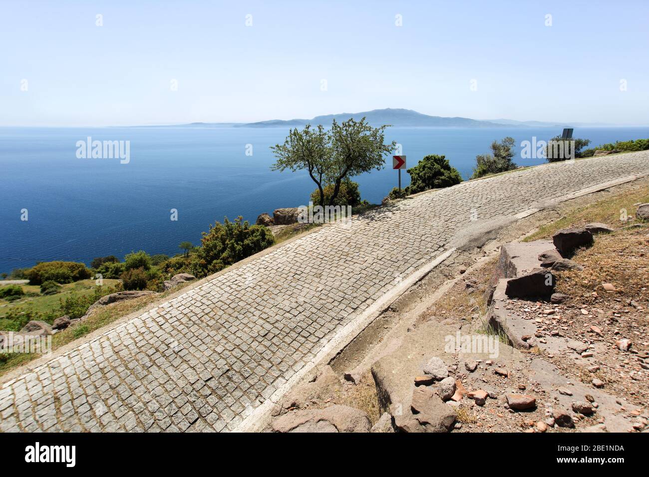 Single tree near to a stone road looking at Aegean Sea Panorama. Lesbos ...