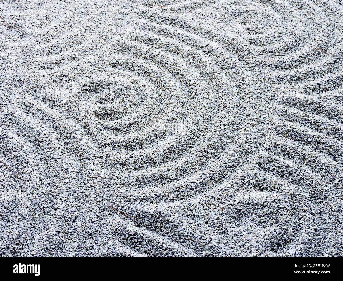 Wavy sand pattern in Japanese rock garden Stock Photo - Alamy