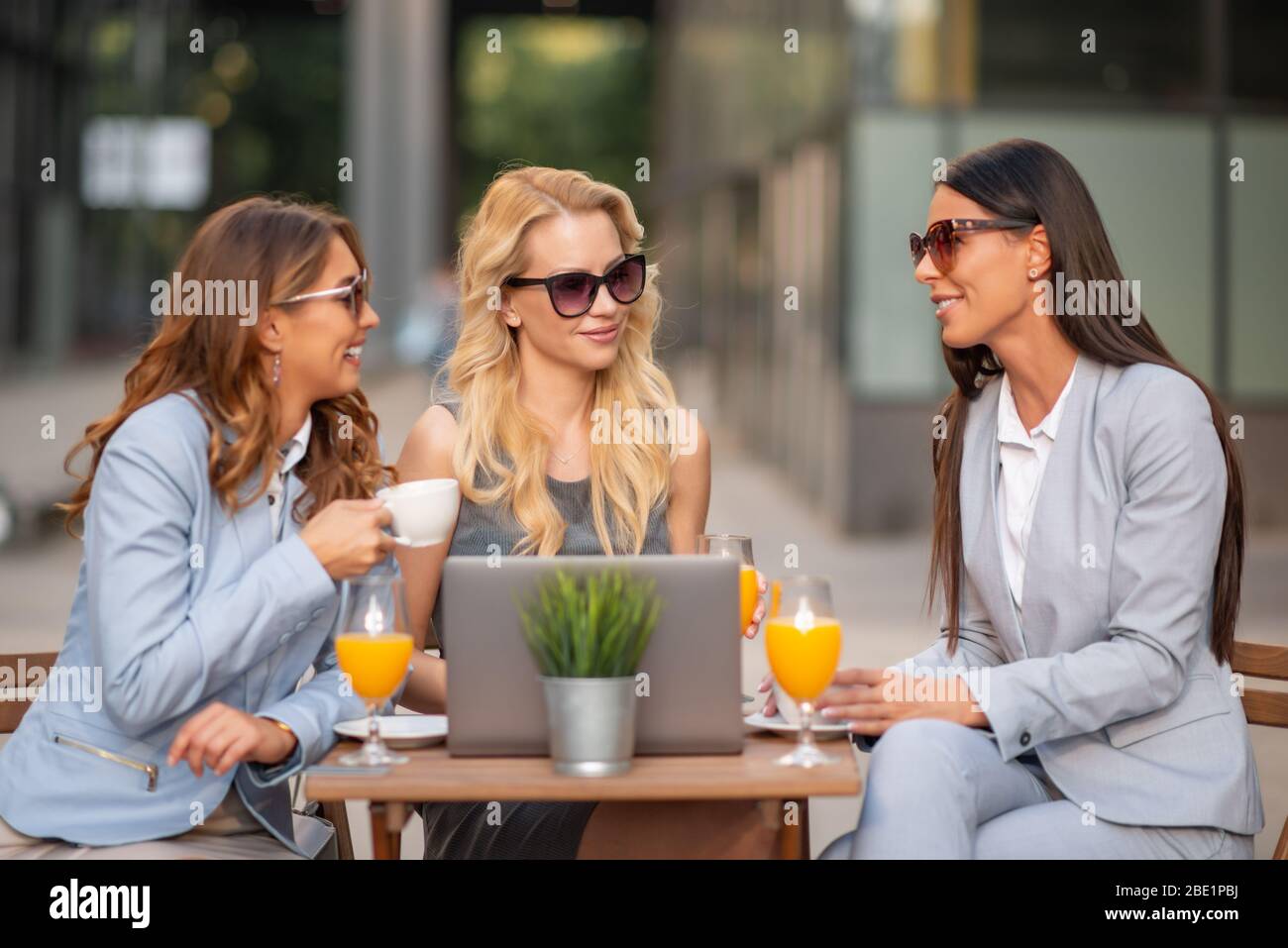 Business meeting in a cafe.Business colleagues relaxing after hard work ...