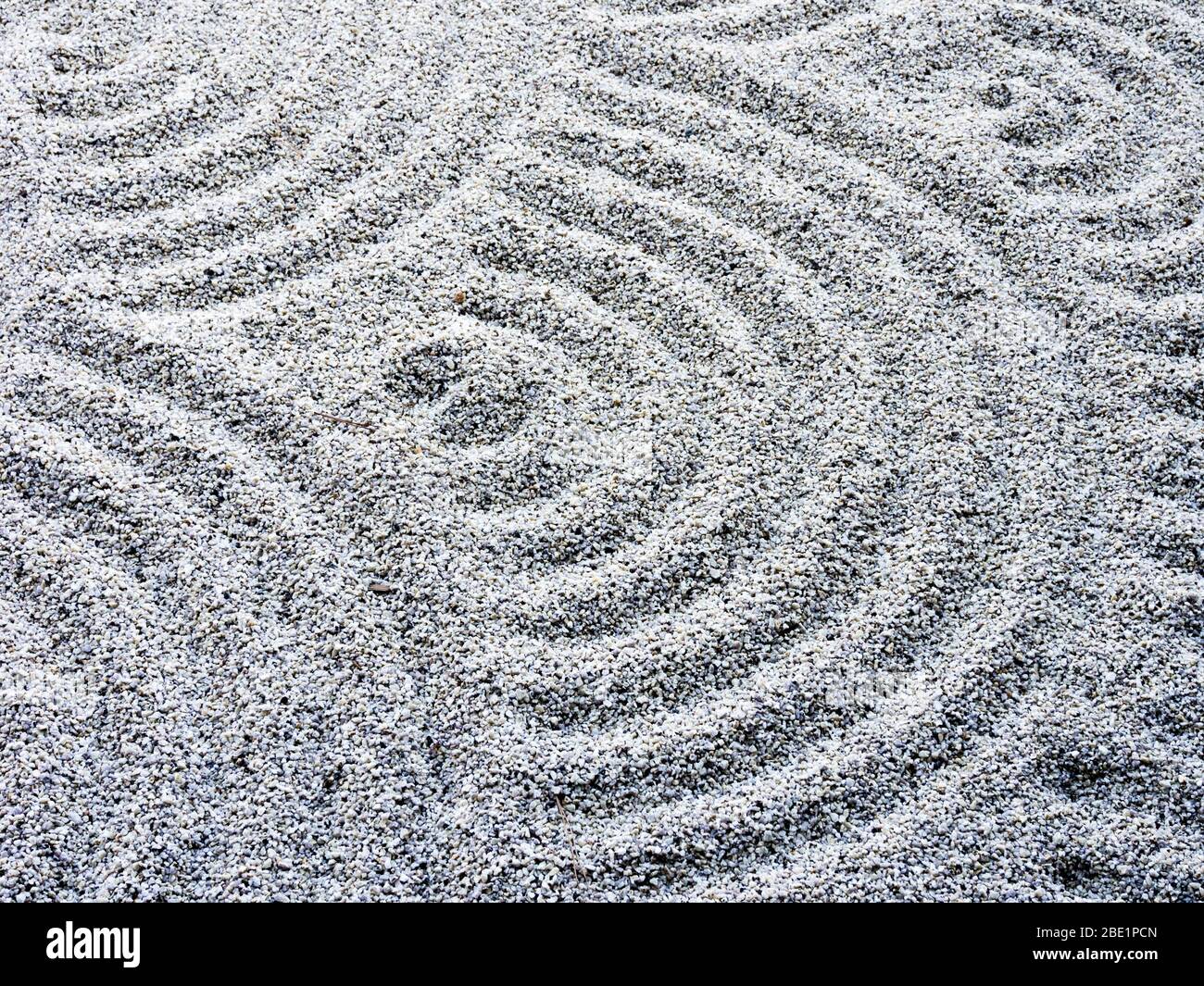 Wavy sand pattern in Japanese rock garden Stock Photo - Alamy
