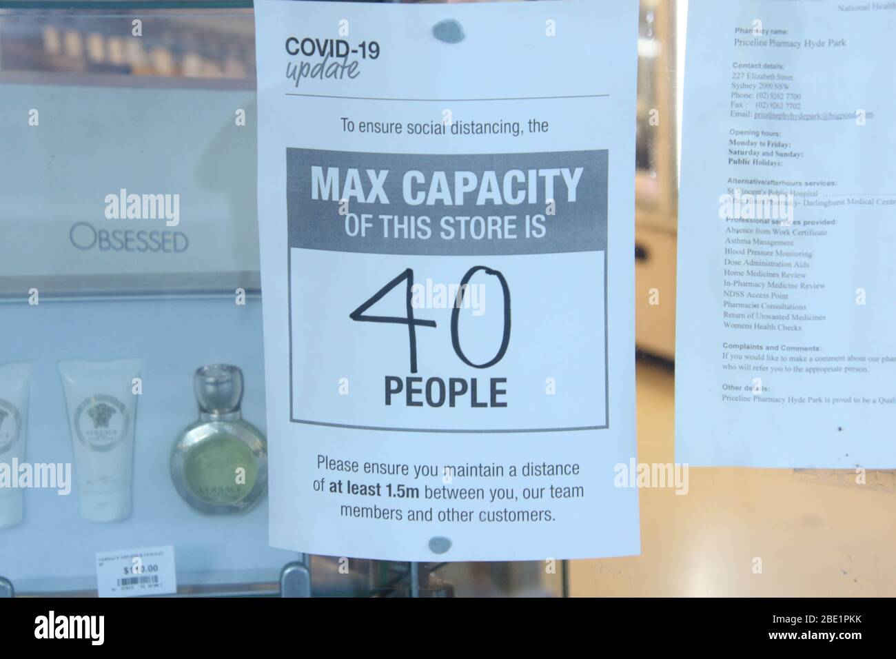 COVID-19 notice indicating maximum store capacity of 40 people Stock ...