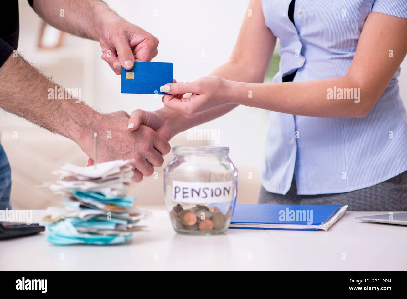 Financial advisor giving retirement advice to man Stock Photo - Alamy