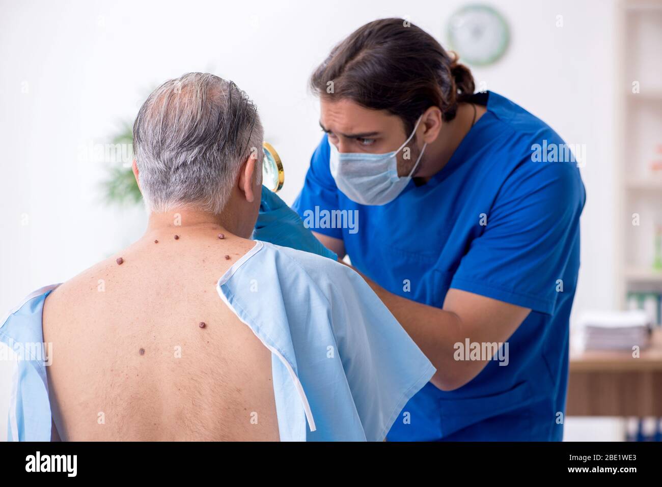 Old man pimple removal hi-res stock photography and images - Alamy