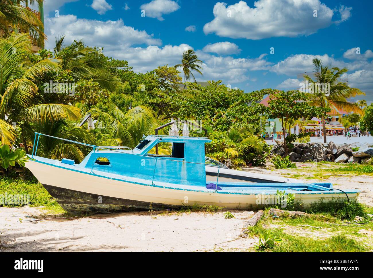 Beached Blue and White Fishing Boat Stock Photo - Alamy