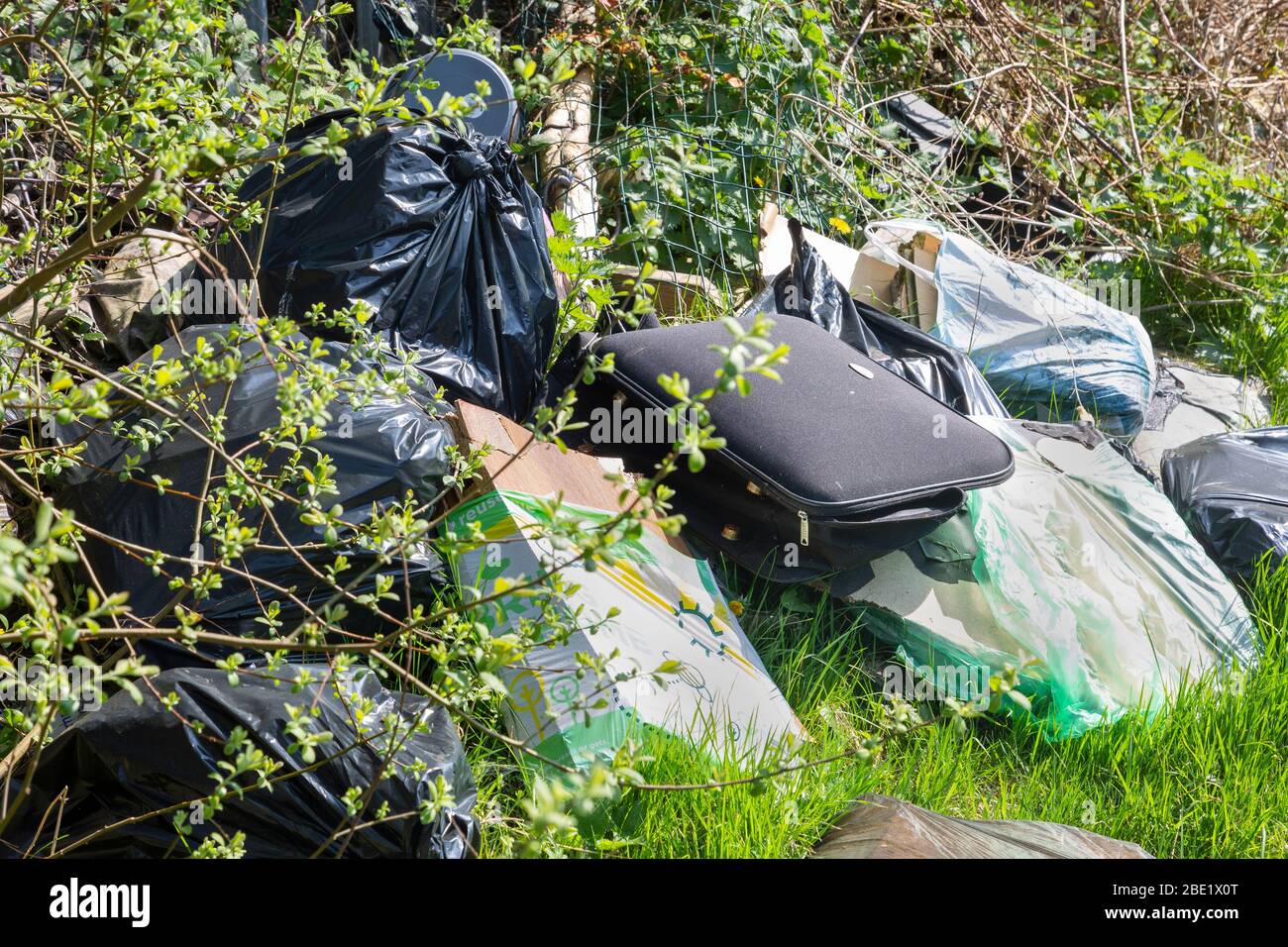 Fly-tipping in a country lane Stock Photo - Alamy