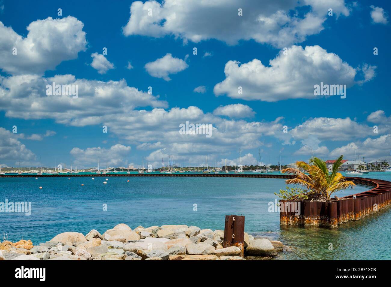 Curving Metal Seawall in St Martin Harbor Stock Photo - Alamy