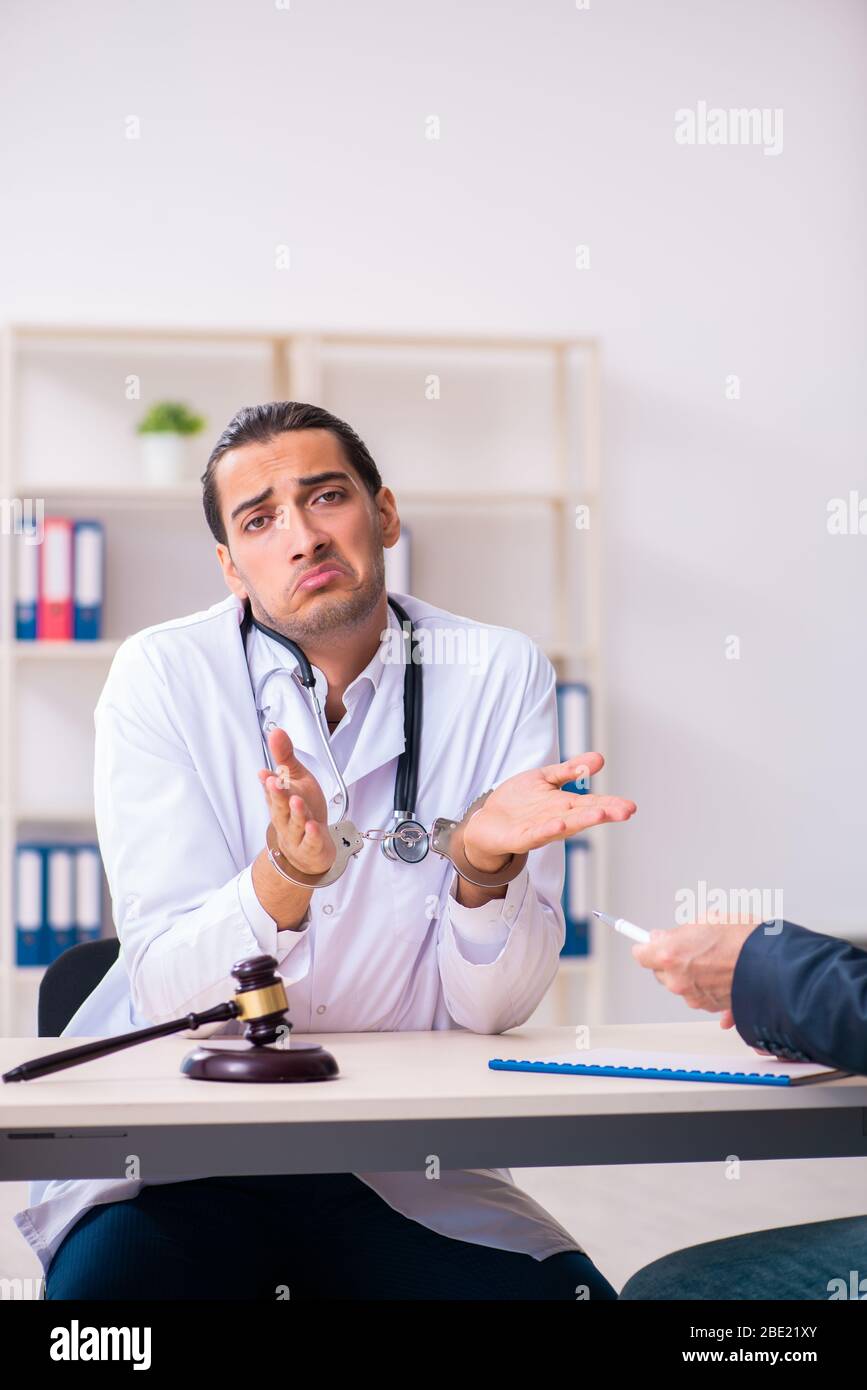 Doctor in courthouse meeting with lawyer Stock Photo - Alamy