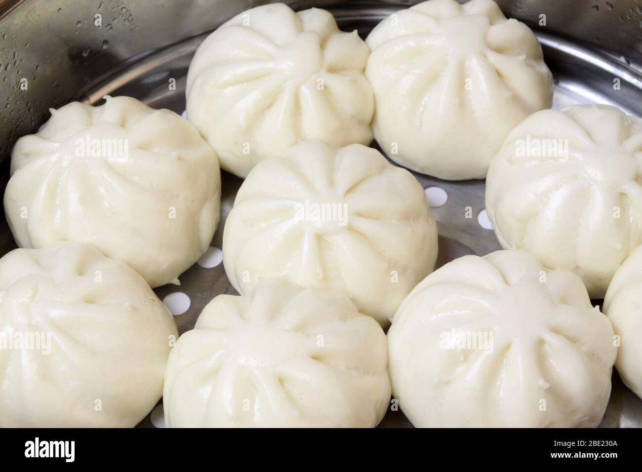 steamed stuffed bun, in a metal steamer Stock Photo - Alamy