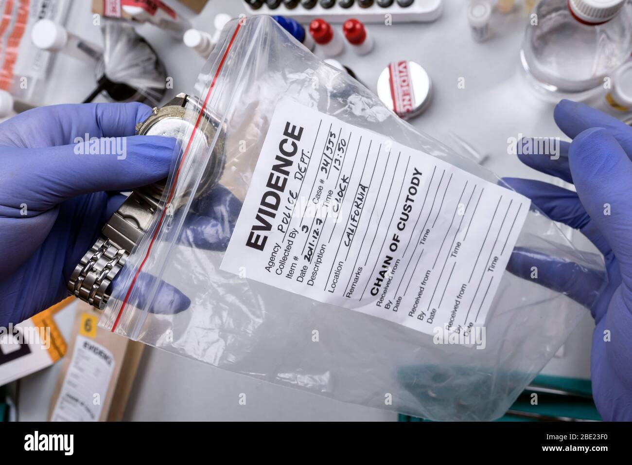 Police scientist working in Criminalistic Lab, victim clock analysis ...