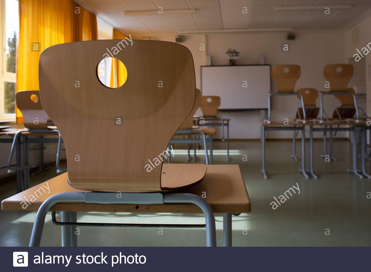 High school classroom empty chair hi-res stock photography and images ...