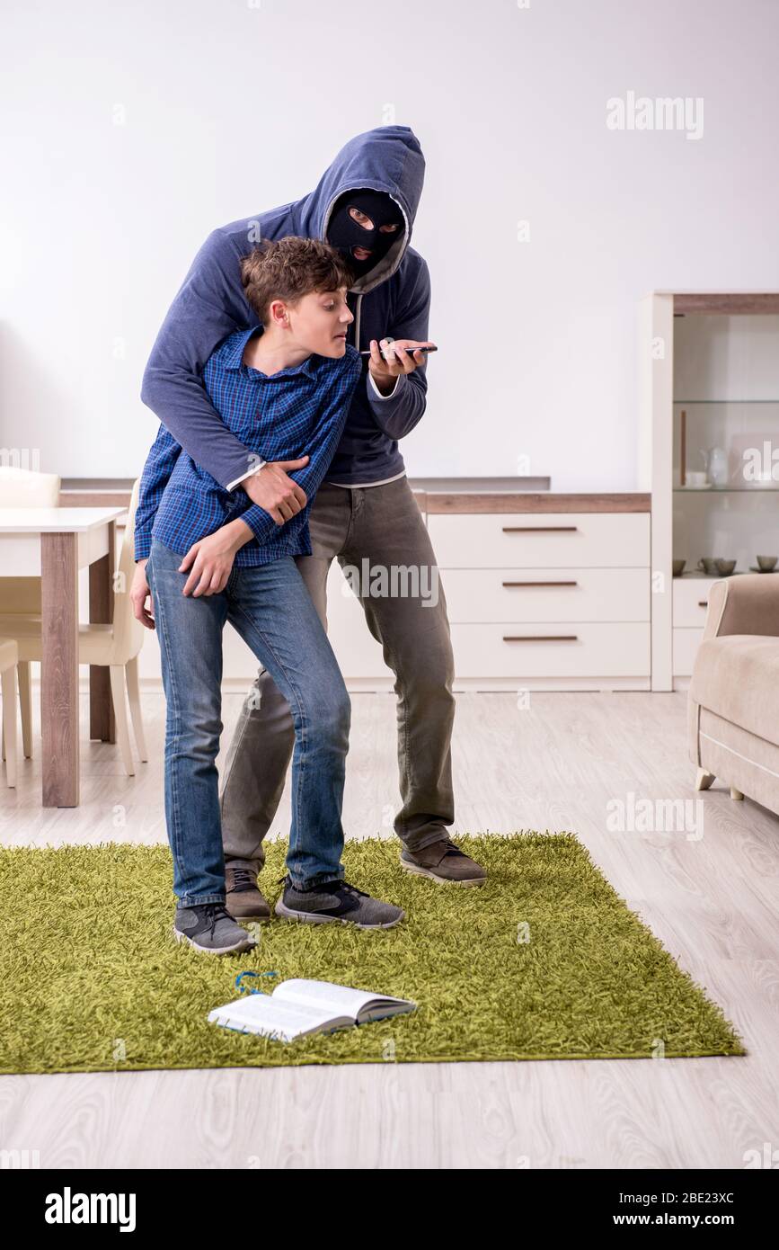 Child abduction concept with the young boy Stock Photo - Alamy