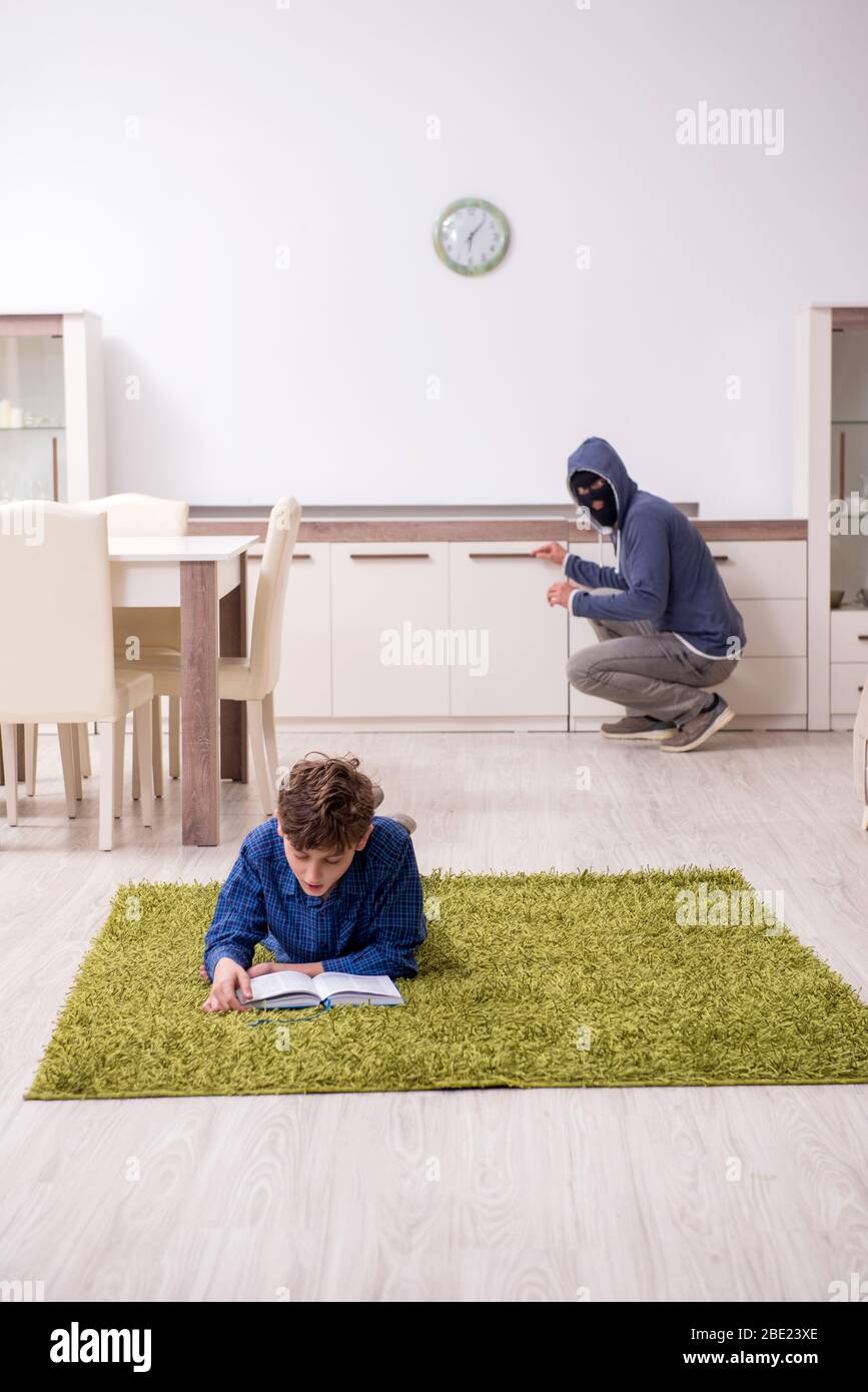 Child abduction concept with the young boy Stock Photo - Alamy